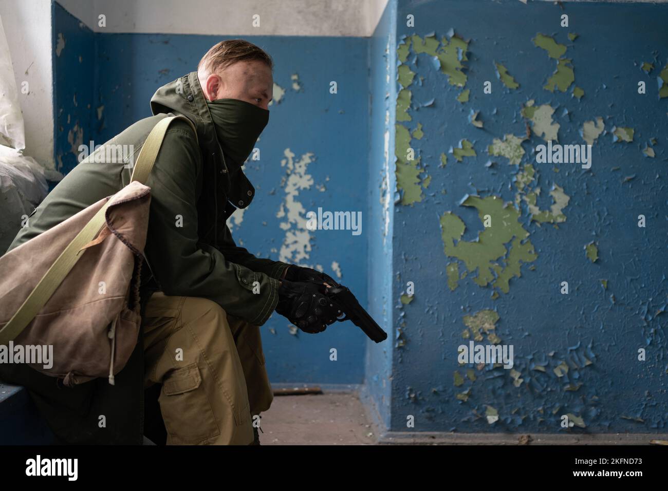 Stalker in the abandoned building. Post apocalypse concept Stock Photo ...