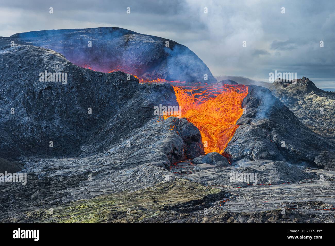 stronger lava flow from a volcanic crater. Landscape on Iceland of ...