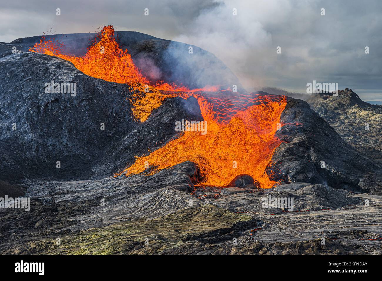 Spraying lava from a volcano on the Reykjanes Peninsula. Volcanic ...
