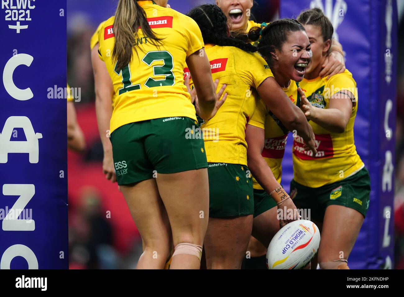 Australia's Kennedy Cherrington celebrates a try with team-mates during ...