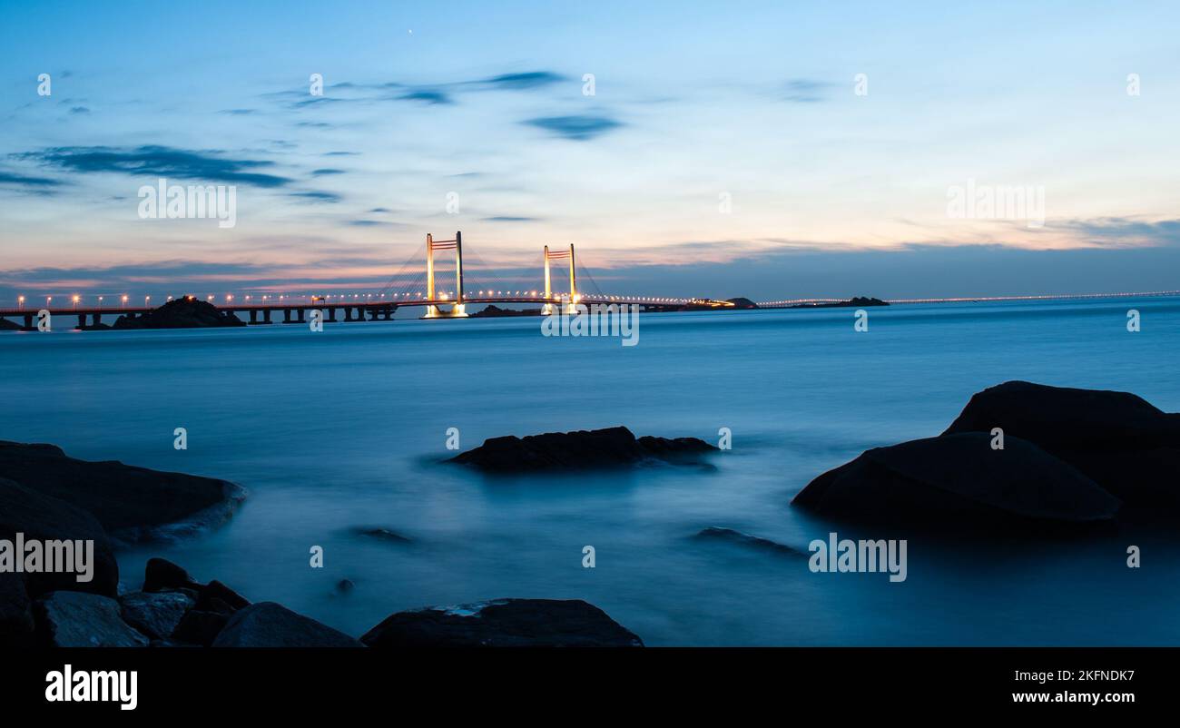 A scenic shot of the Donghai Bridge across Hangzhou Bay in China during ...