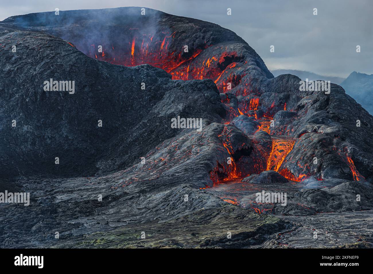 Details of a volcanic crater. Crater opening from the side. some lava ...