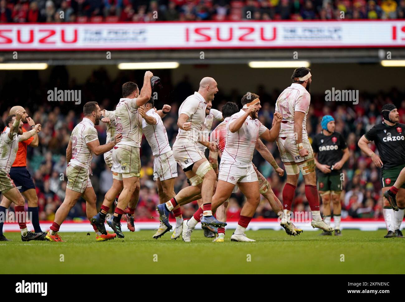 Georgia's players celebrate victory at the final whistle after the ...