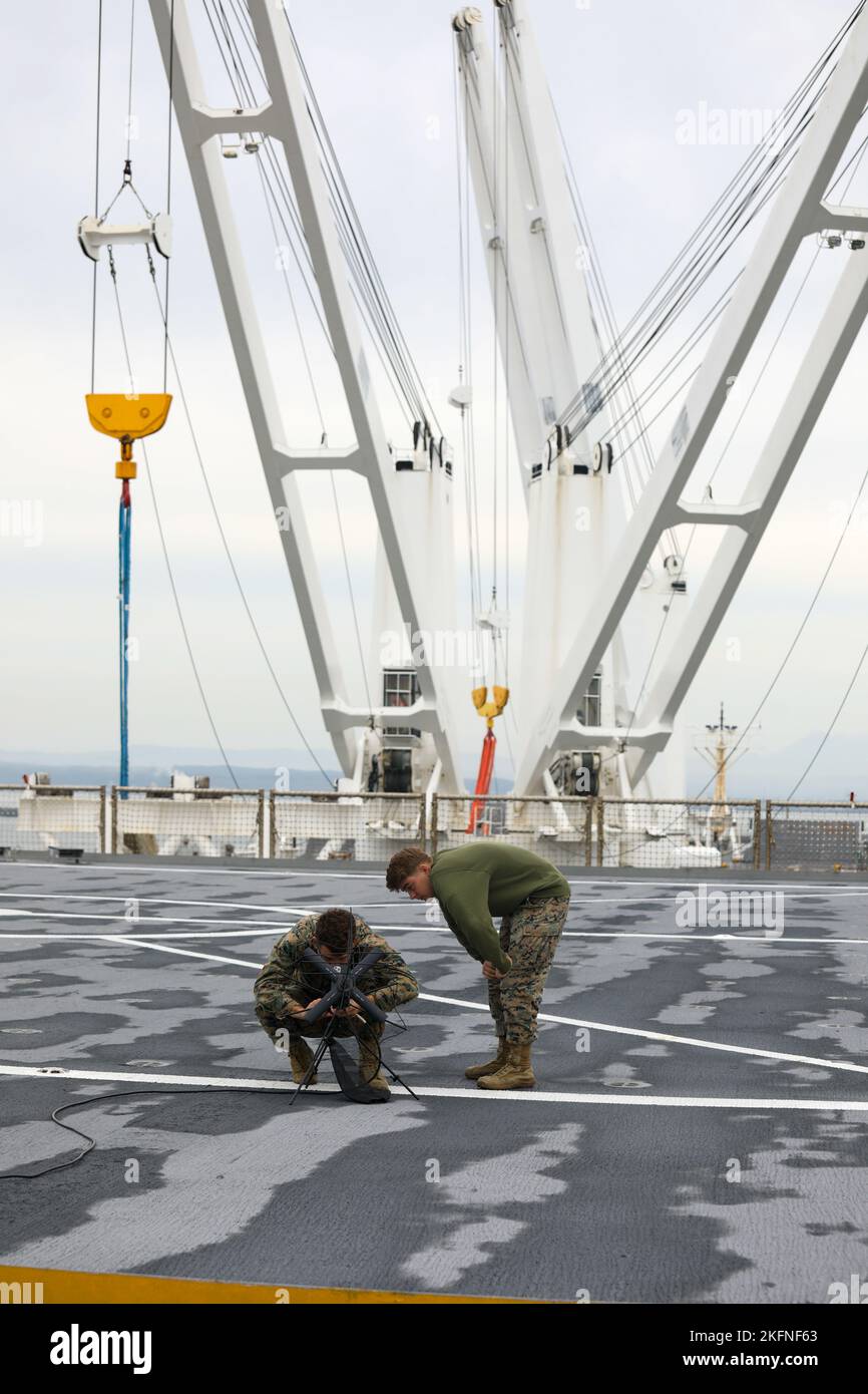 U.S. Marine Corps Cpl. Austin Smith, left, and Cpl. Christopher Eiklor ...