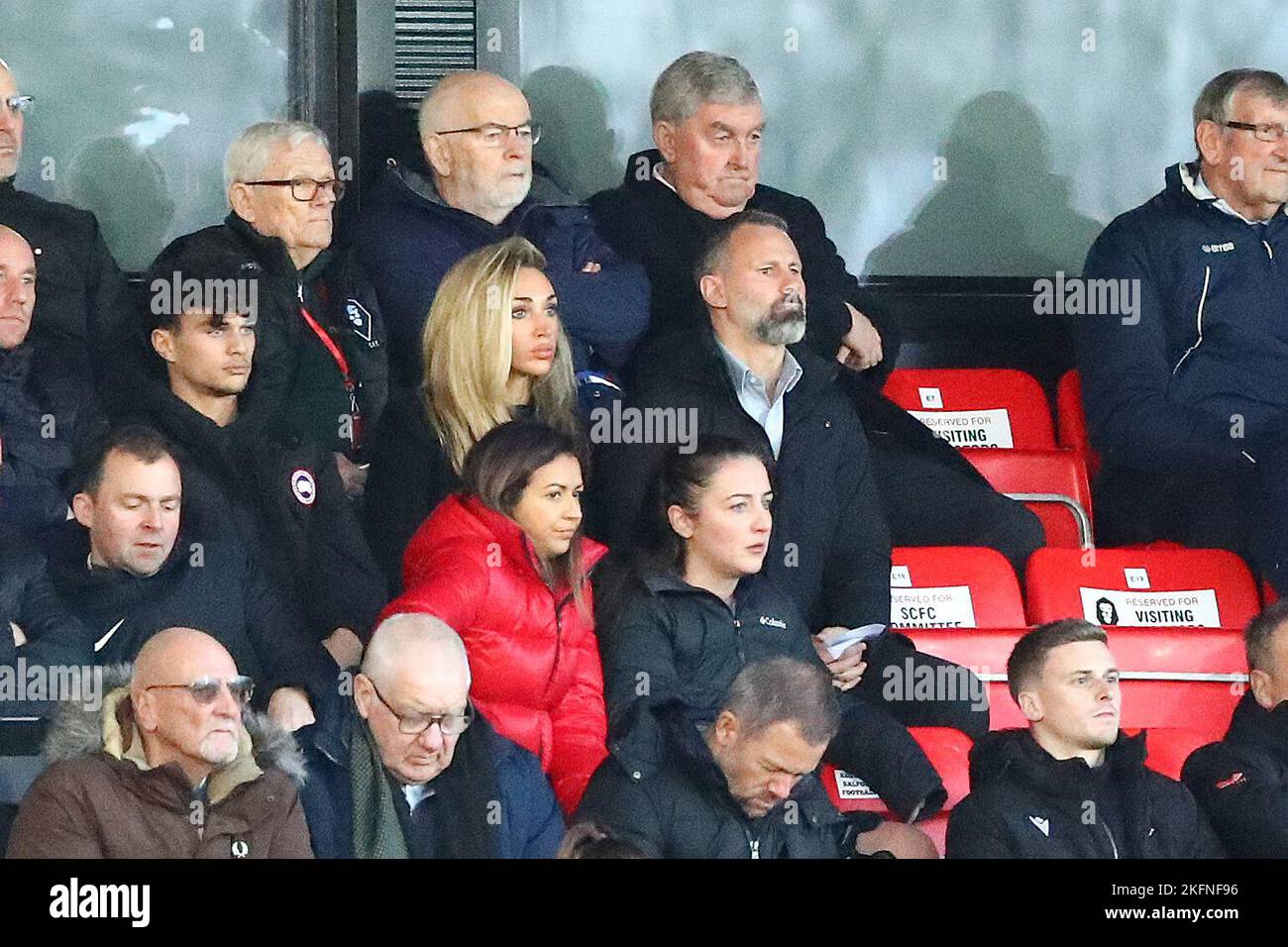 Ryan Giggs (right) and his partner Zara Charles in the stands during ...