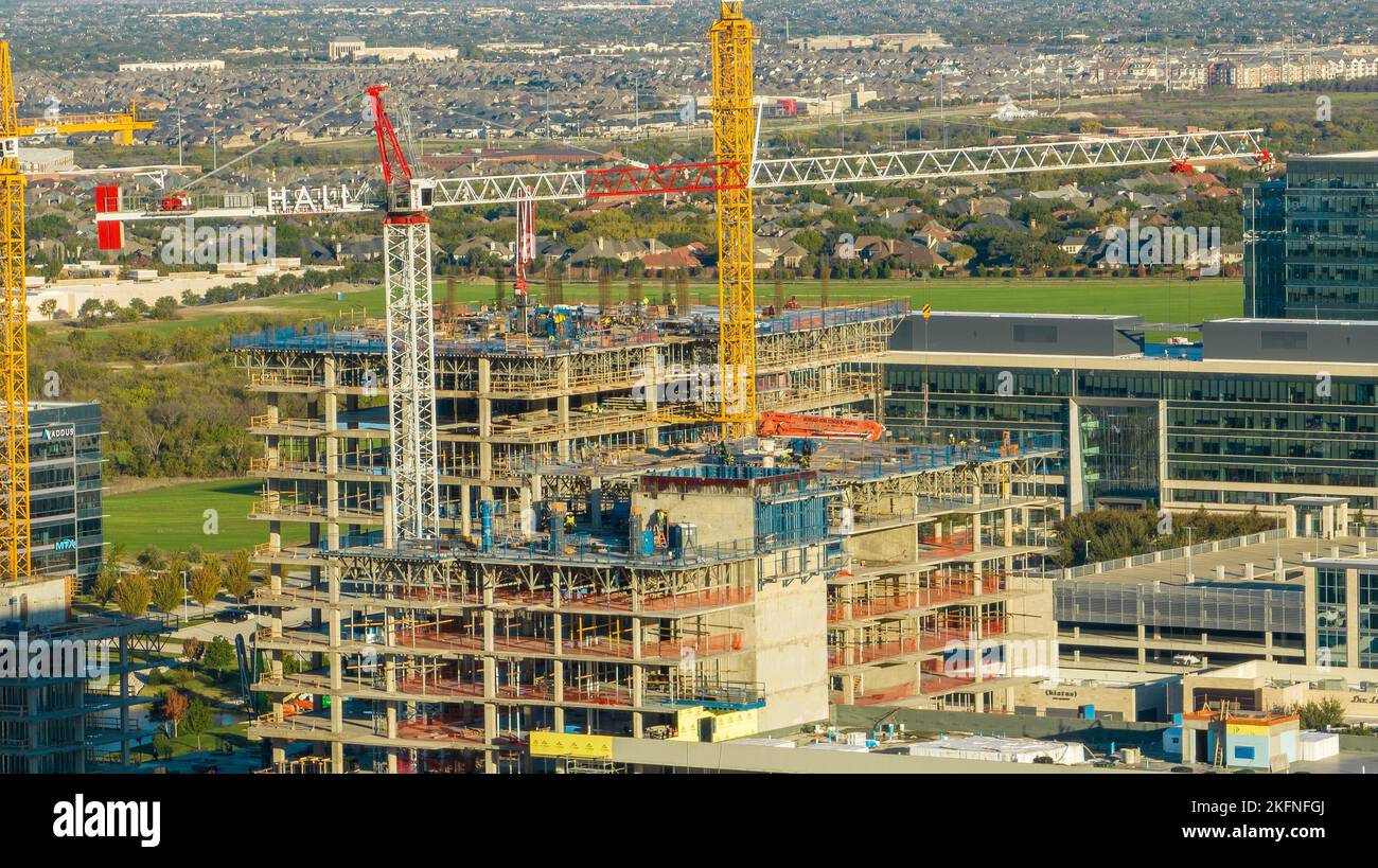 An aerial shot of the process of building a residential building with ...