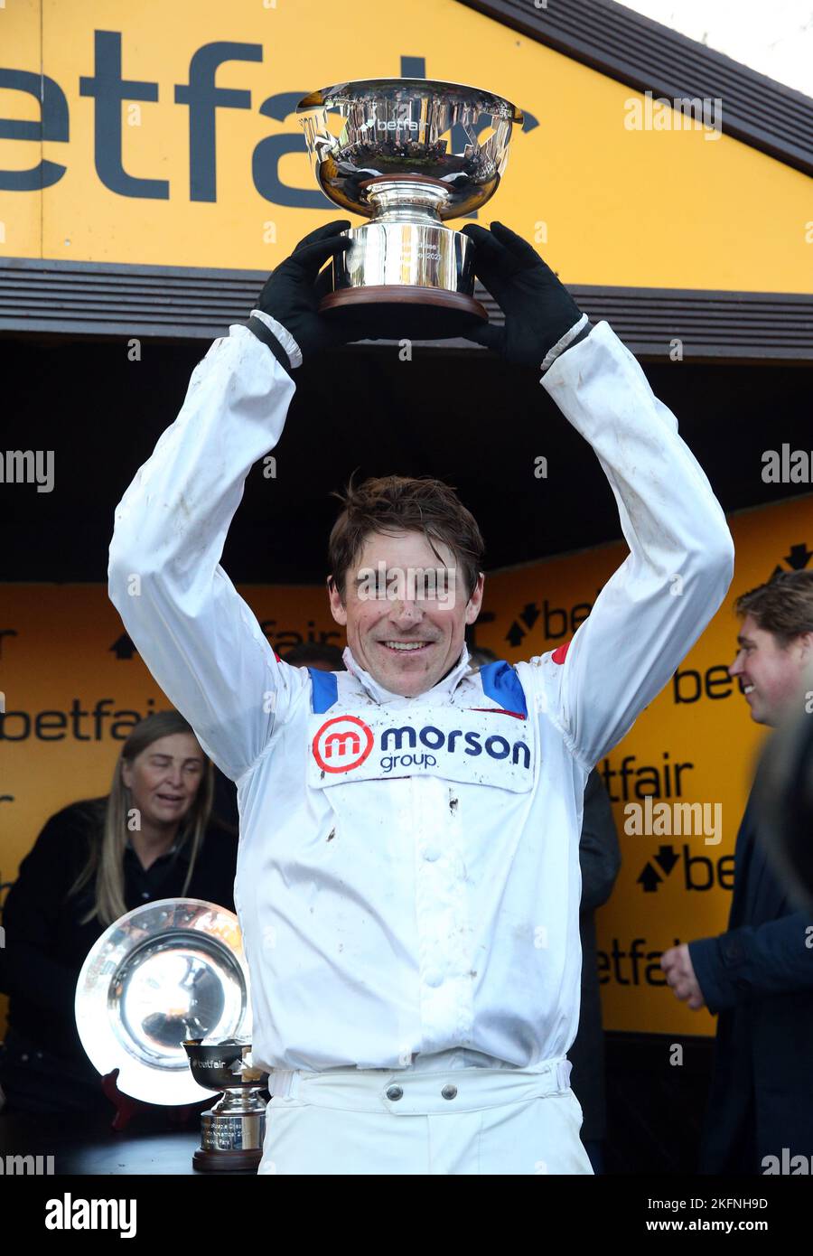 Harry Skelton lifts the trophy after winning the Betfair Chase with ...
