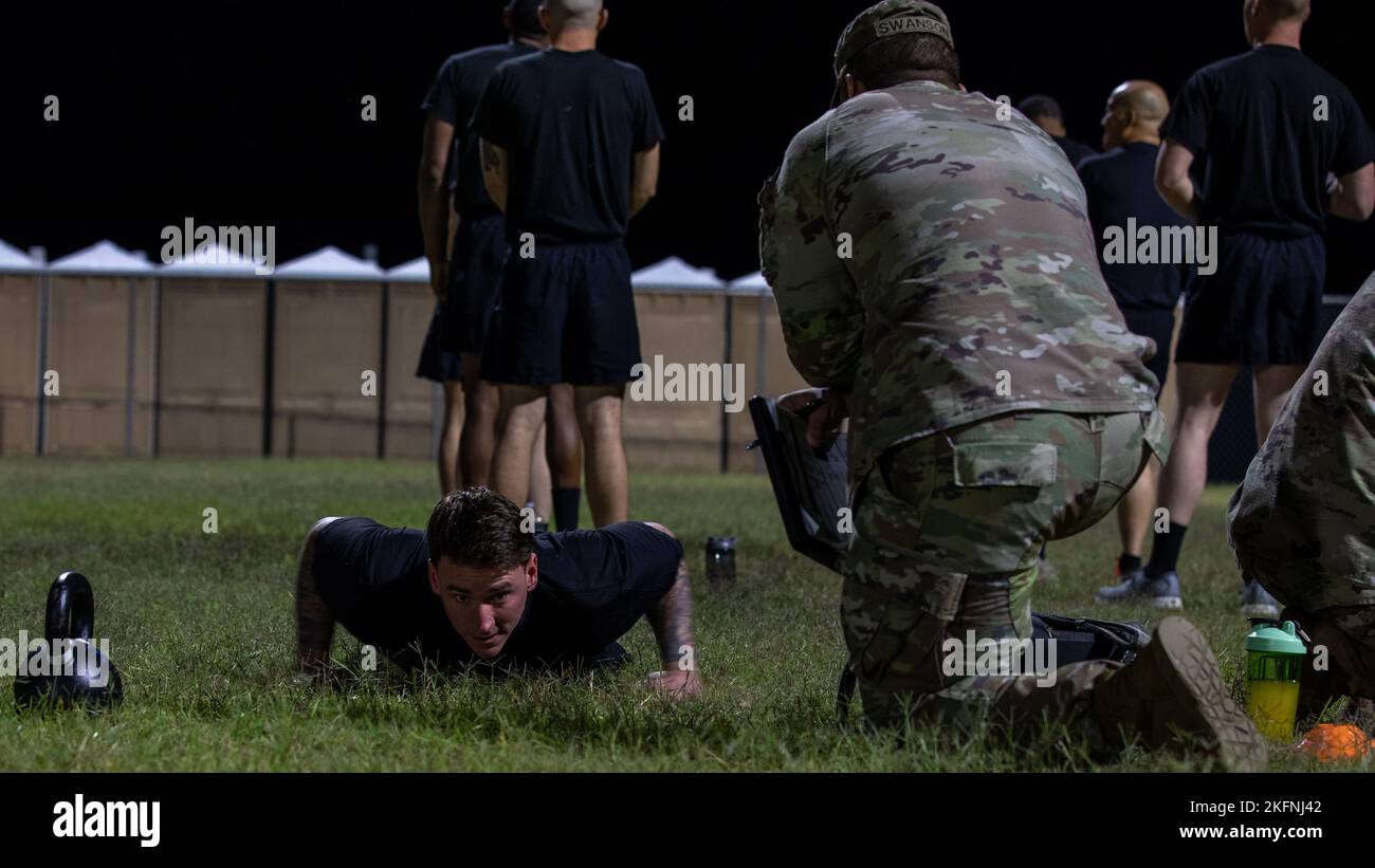 U.S. Soldiers competing in the Army Best Squad Competition take a ...