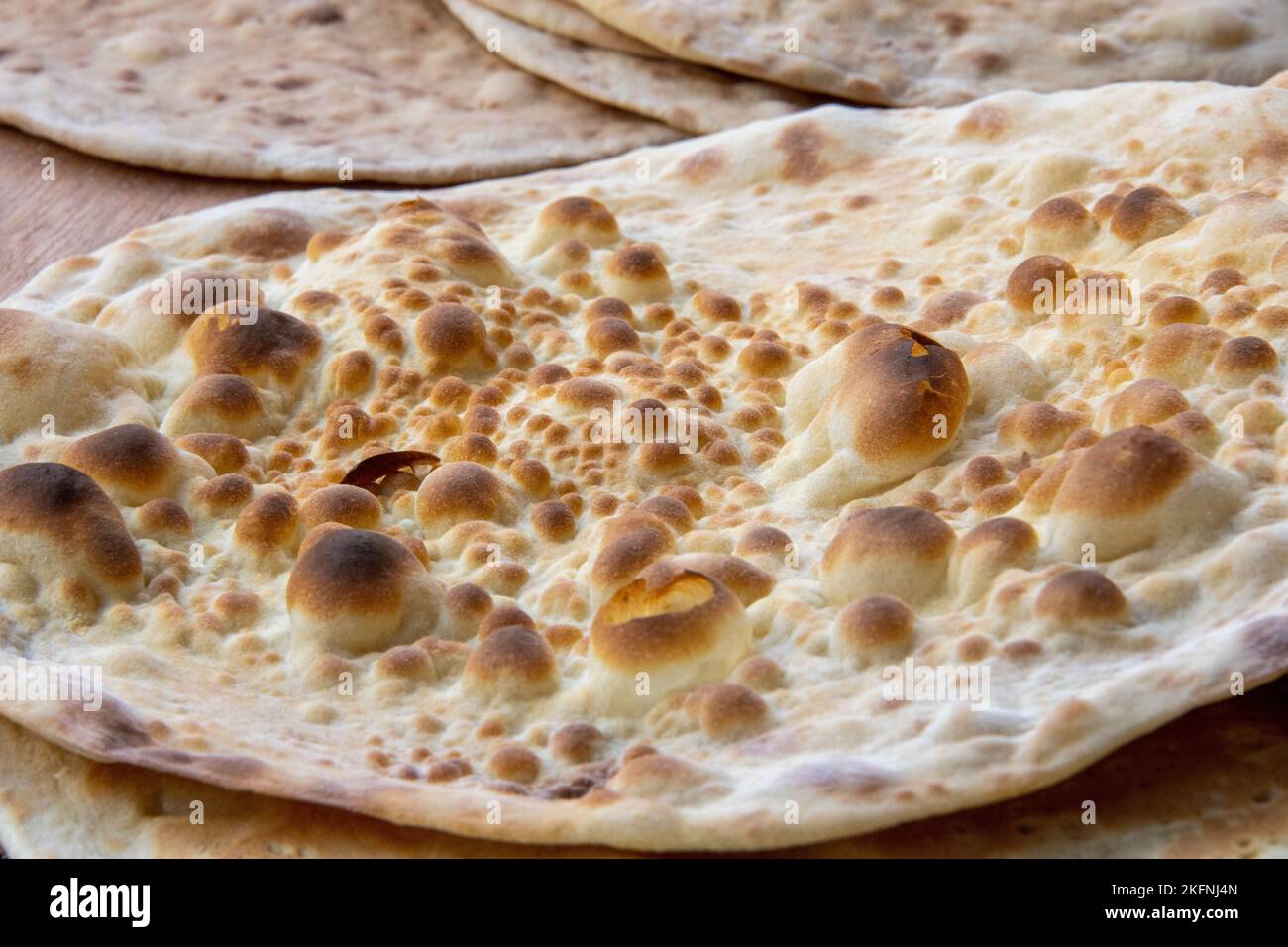 Fresh baked bread in a traditional way in the arabic lands Stock Photo ...