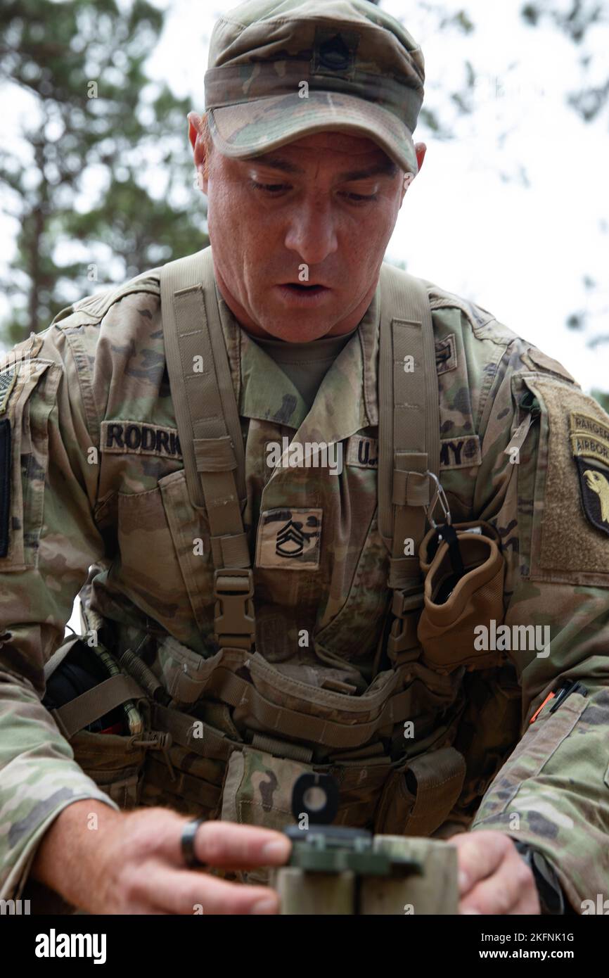 An U.S. Soldier orients his compass before starting the Land Navigation ...