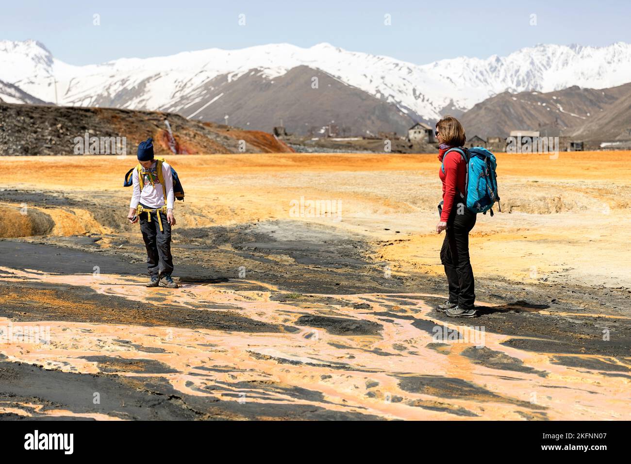 Mother and son looking at the Truso travertines while hiking in truso ...