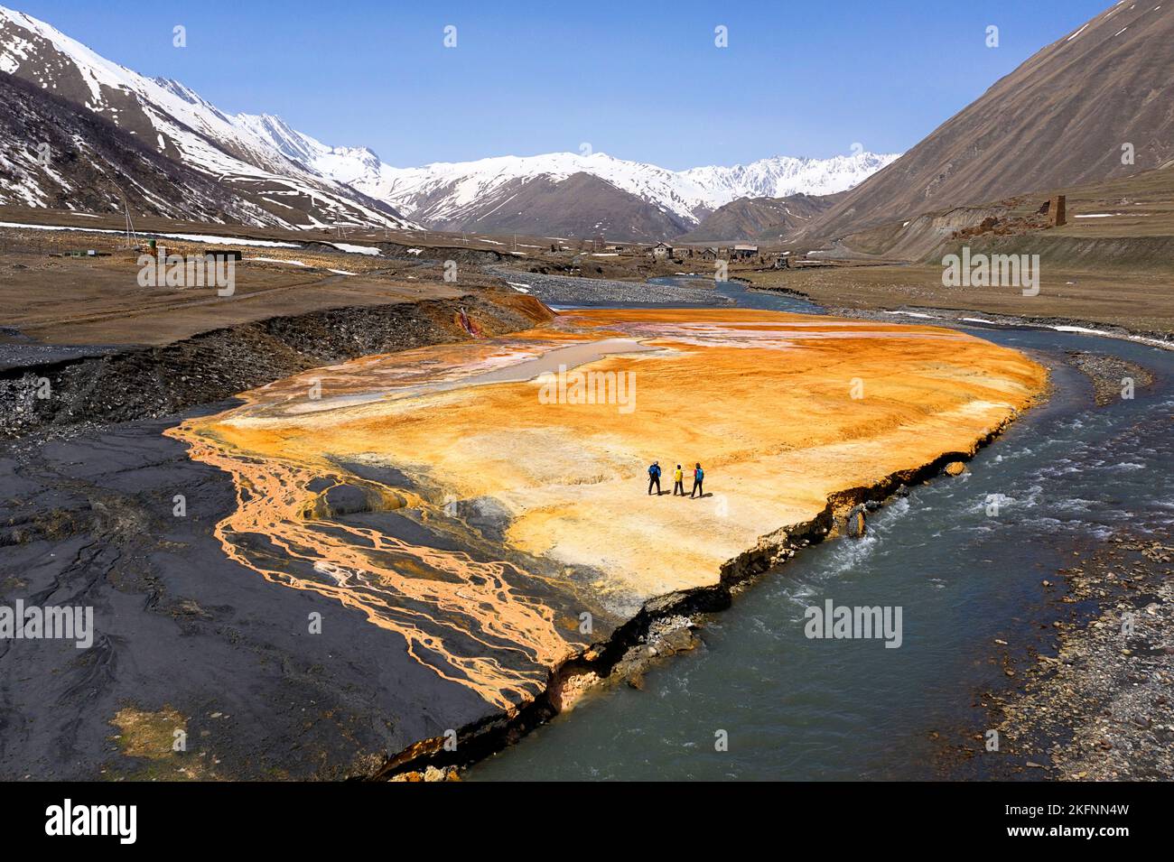 Aerial view of Hikers looking at the Truso Travertines Natural Monument ...