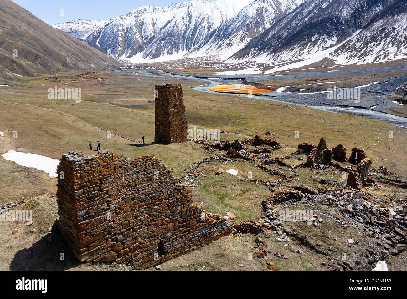 Aerial view of hikers near Ketrisi Former Tower and ruins of abandoned ...