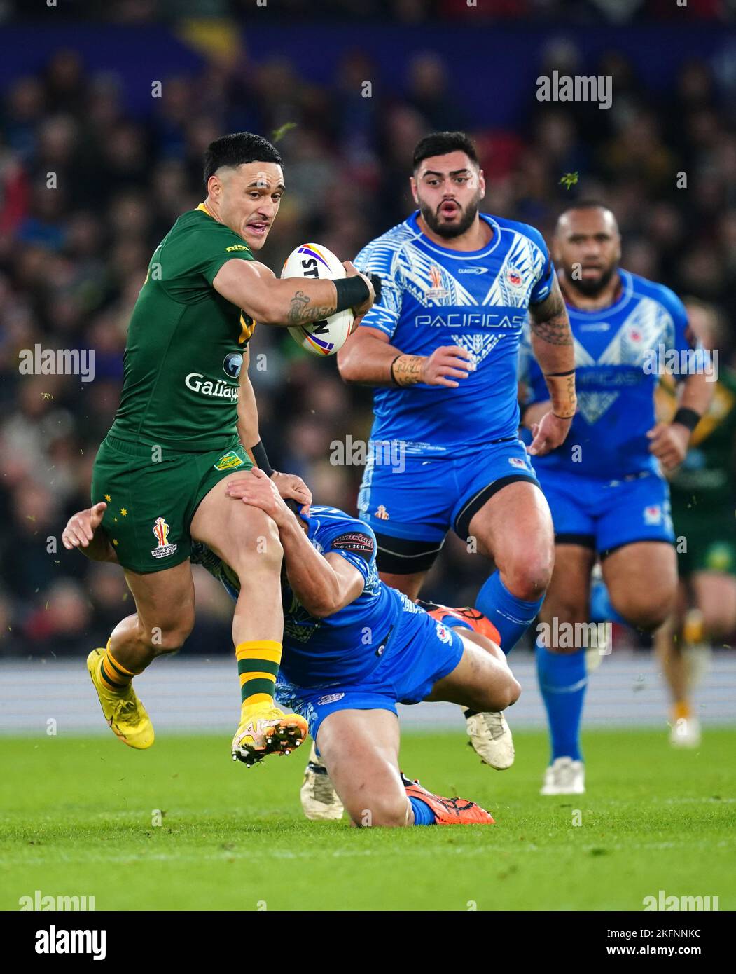 Australia's Valentine Holmes tackled by Samoa's Joseph Suaali'i during ...