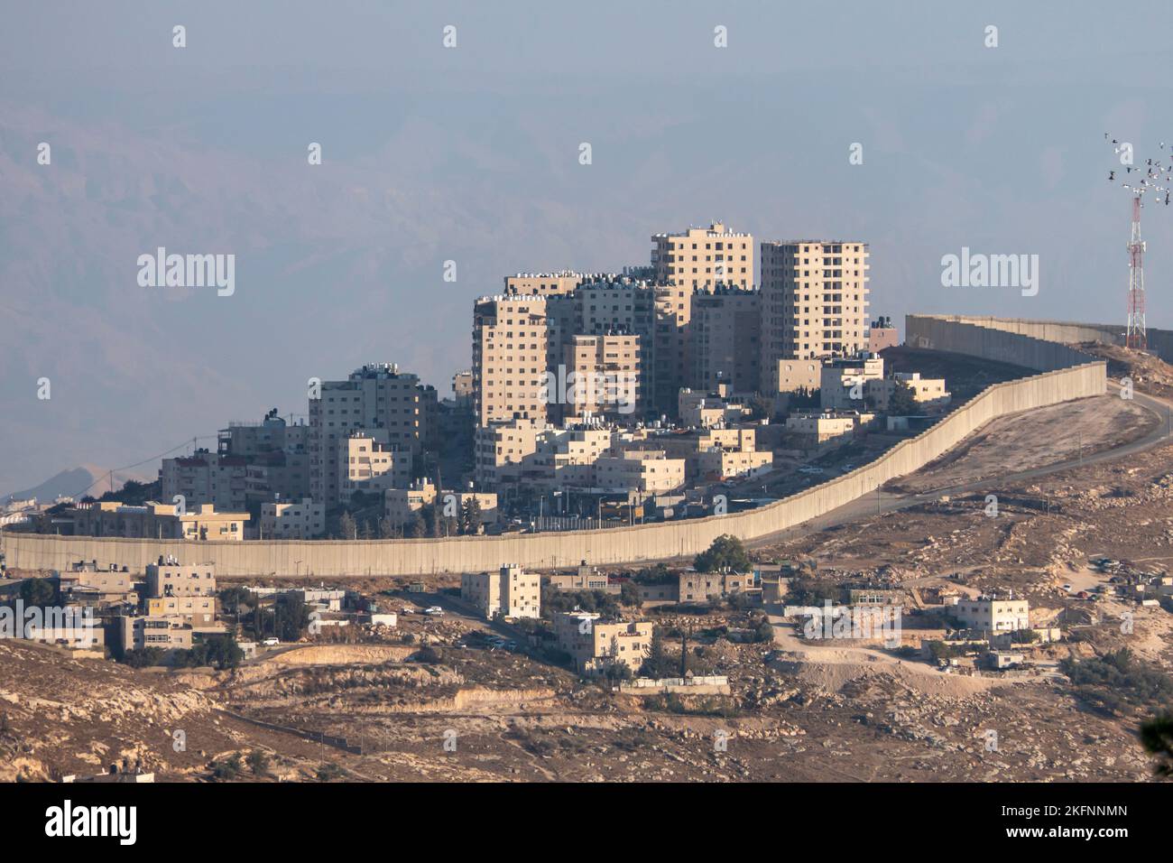 View of the Israeli West Bank separation barrier cutting through Abu ...