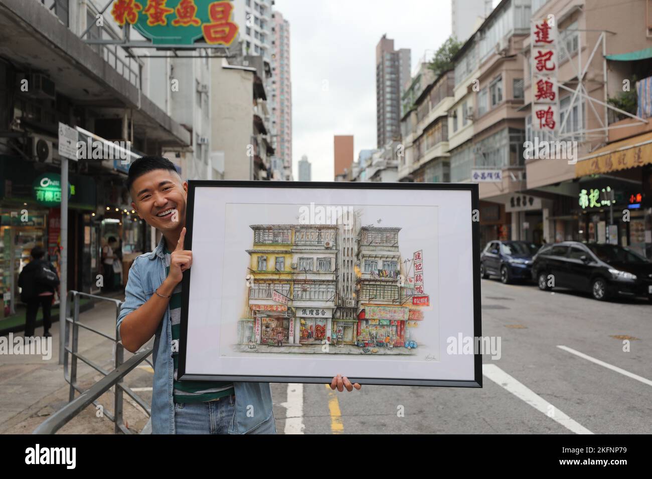 Hong Kong artist Alvin CK Lam (with one of his watercolour urban ...