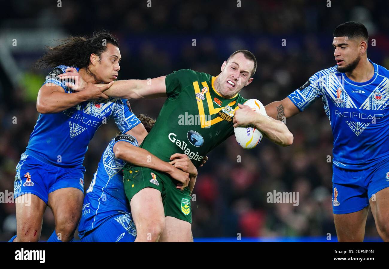 Australia's Isaah Yeo tackled by Samoa's Jarome Luai and Chanel Harris ...