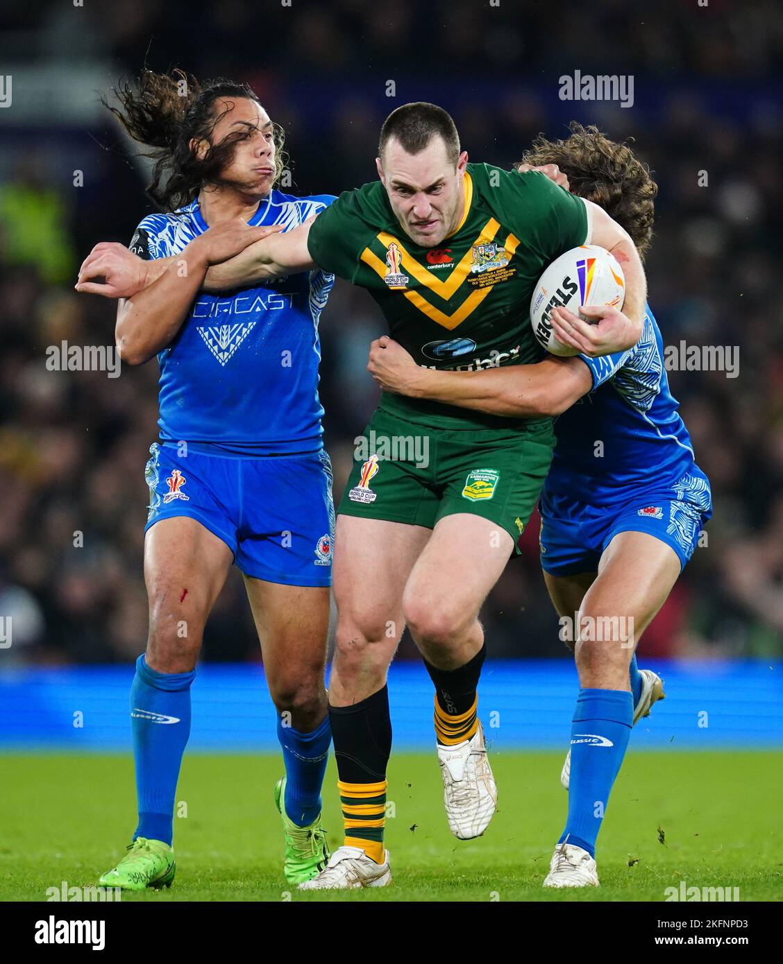 Australia's Isaah Yeo (centre) tackled by Samoa's Jarome Luai and ...