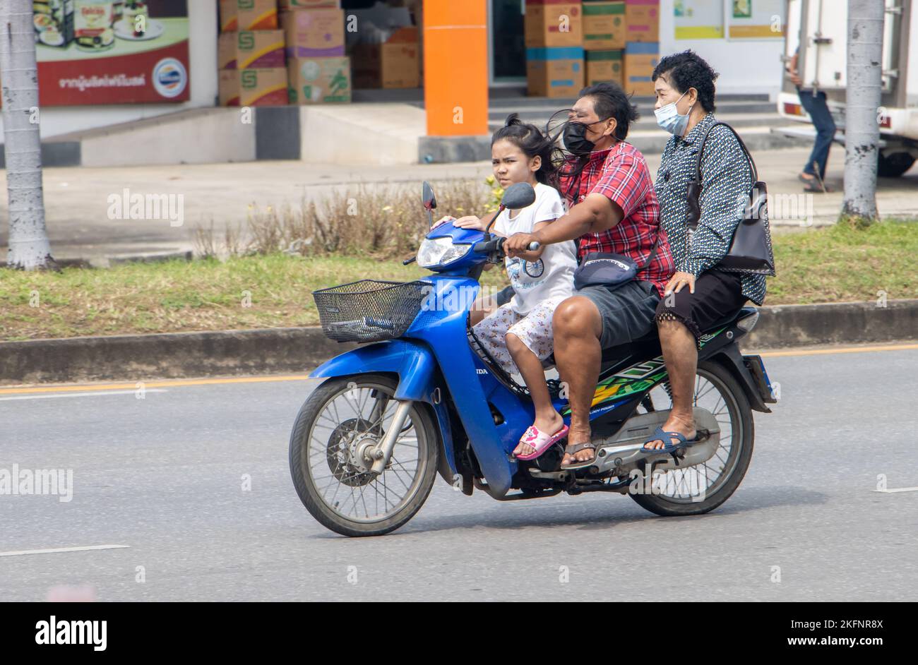 Three people riding a motorcycle hi-res stock photography and images ...