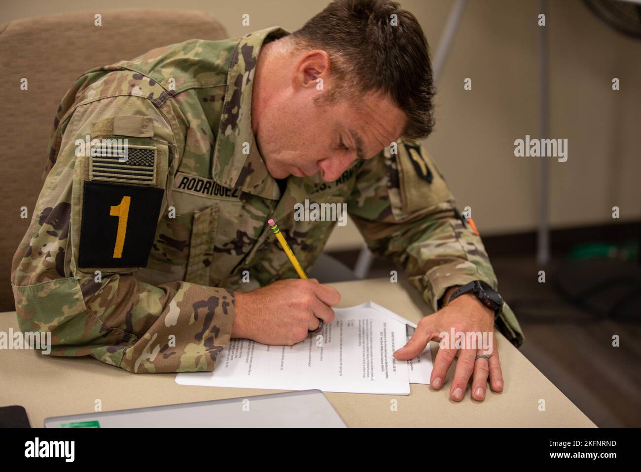 U.S. Soldiers competing in the Army Best Squad Competition take a ...