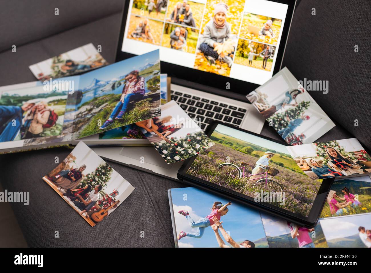 Laptop with photo, photoalbum, album Stock Photo - Alamy