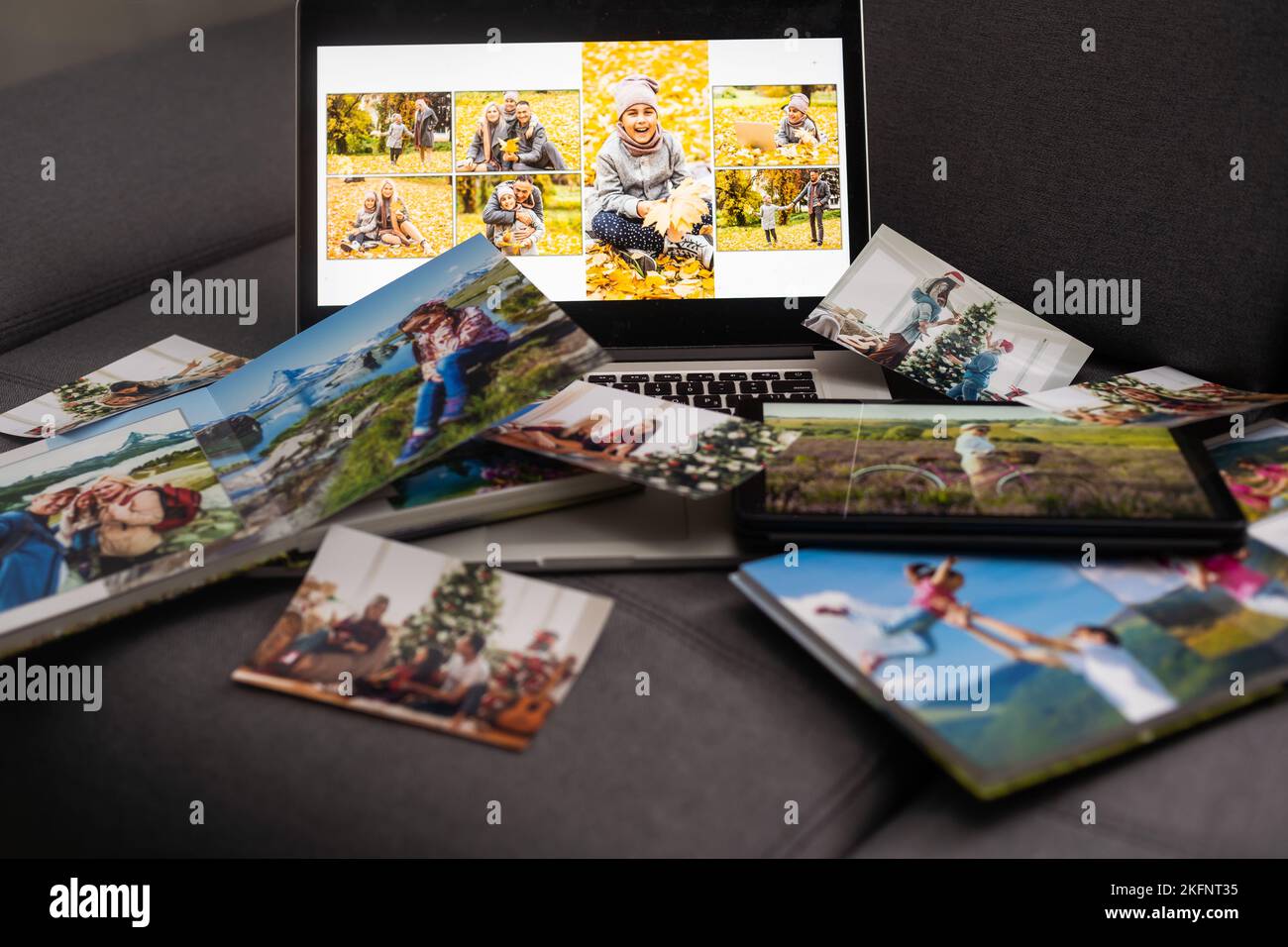 Laptop with photo, photoalbum, album Stock Photo - Alamy