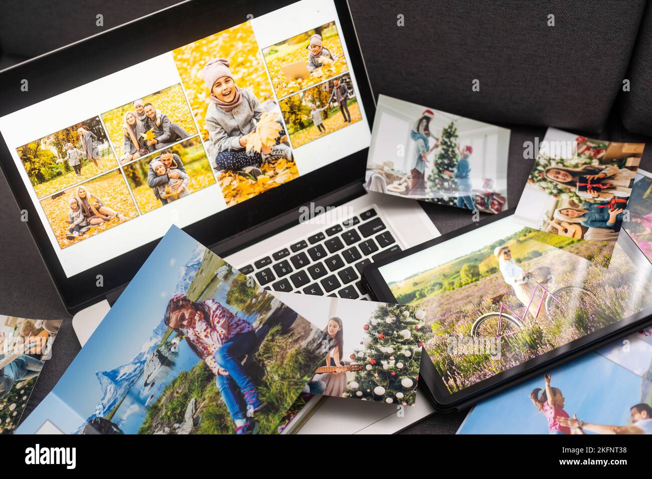 Laptop with photo, photoalbum, album Stock Photo - Alamy