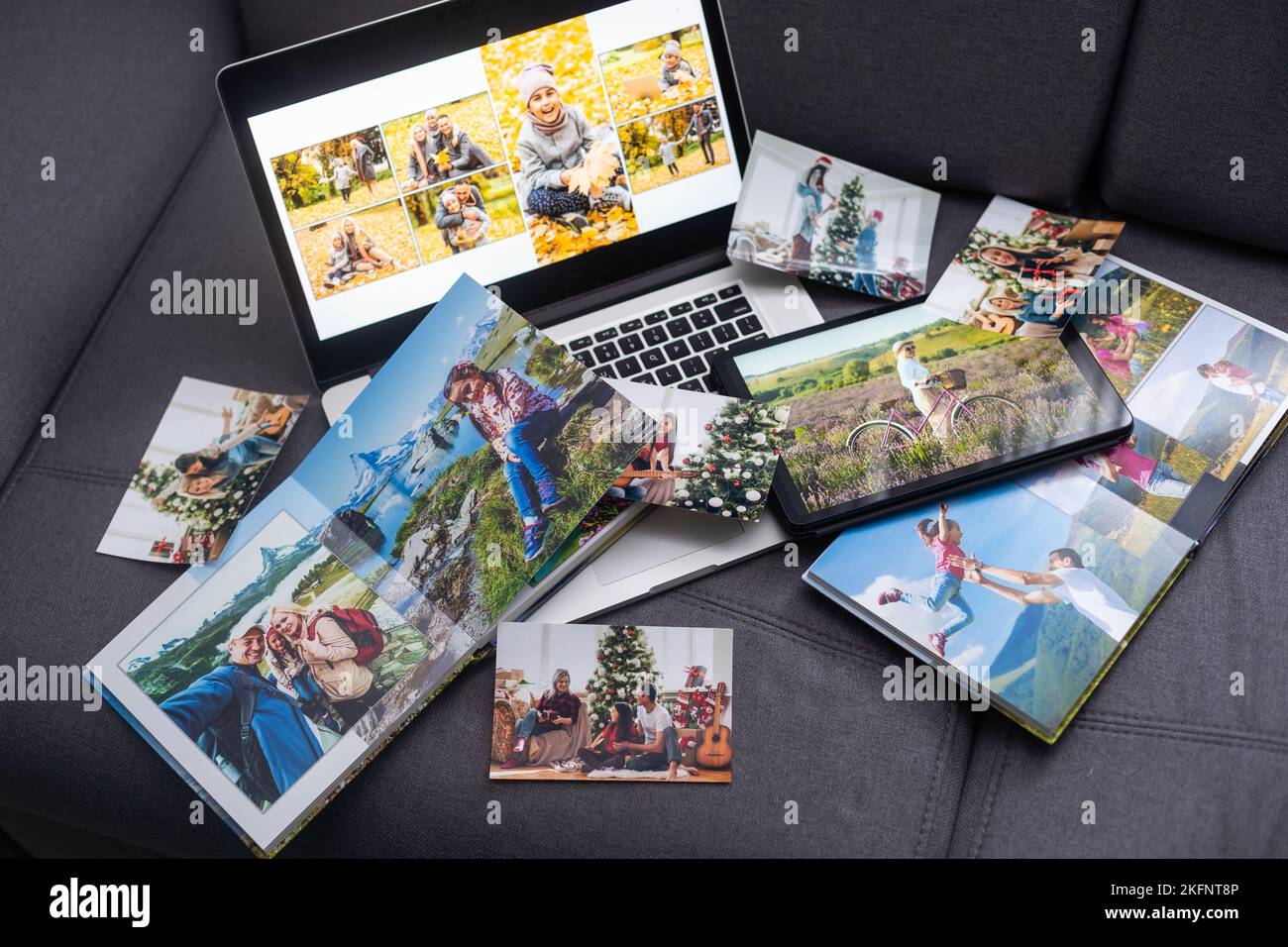 Laptop with photo, photoalbum, album Stock Photo - Alamy