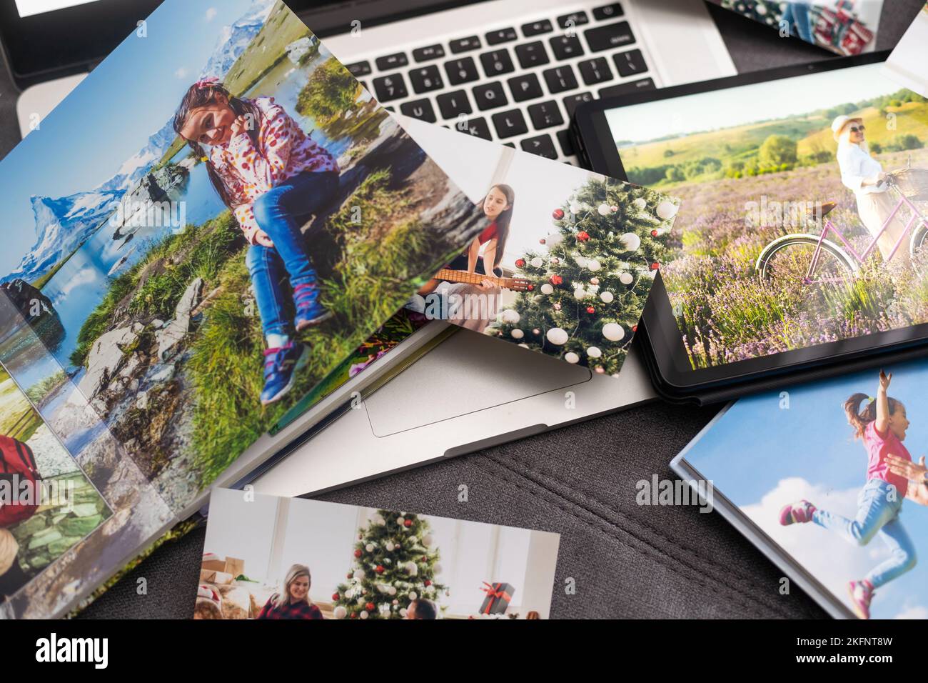 Laptop with photo, photoalbum, album Stock Photo - Alamy