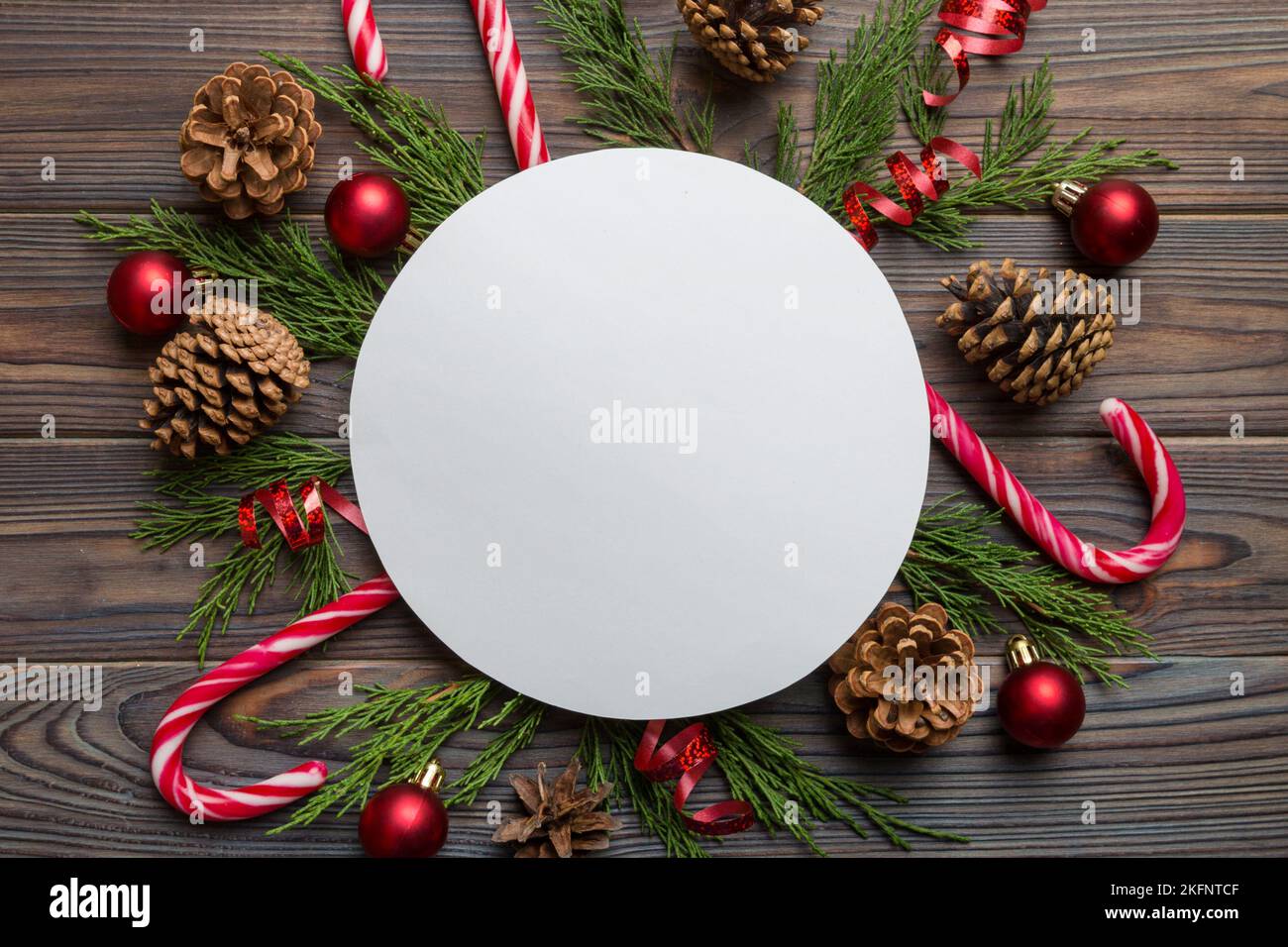 Flat lay Christmas composition. Round Paper blank, pine tree branches ...