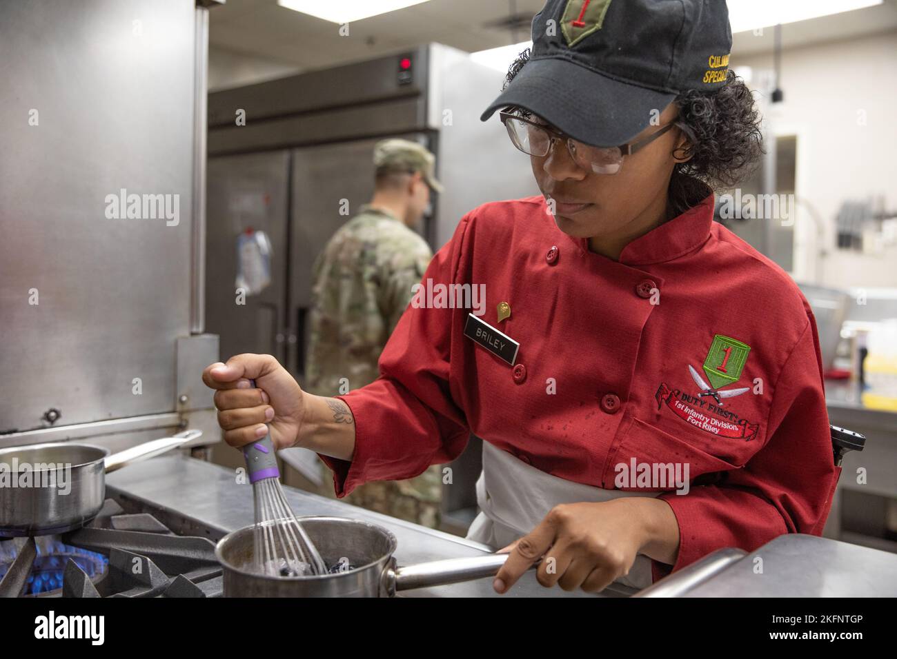 U.S. Army Spc. Denea Briley, a culinary specialist assigned to 1st ...