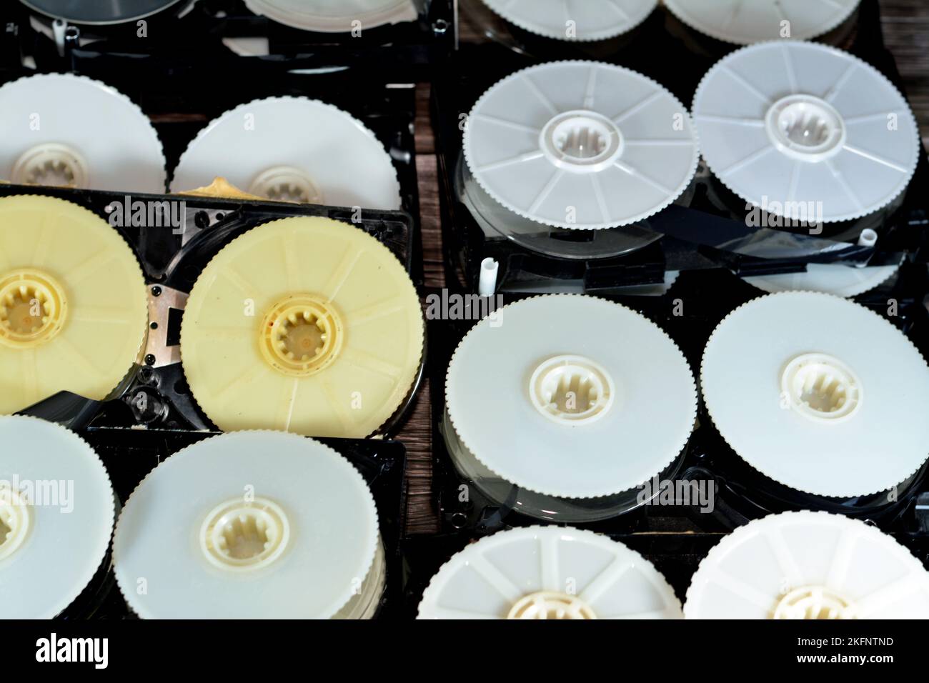 Pile of VHS video cassette tape from inside with the front casing ...