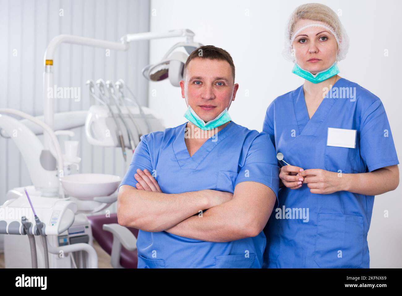 Two confident dentists Stock Photo - Alamy