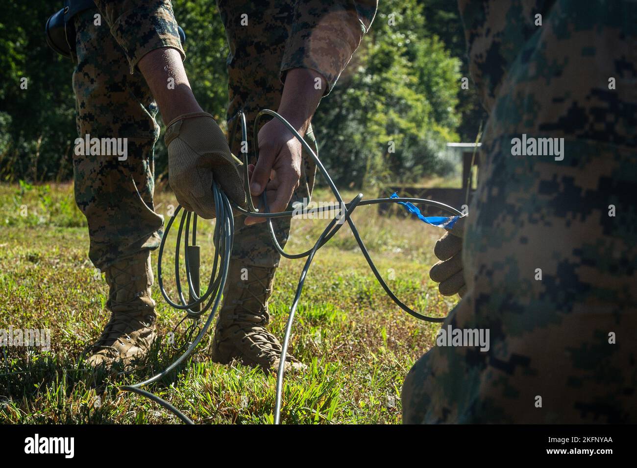 U.S. Marines with Weapons Training Battalion emplace explosive material ...