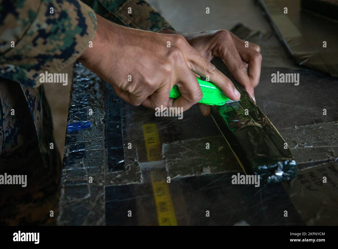 U.S. Marines with Weapons Training Battalion set up explosive materials ...