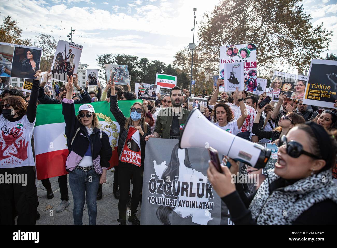Istanbul, Turkey. 19th Nov, 2022. A woman seen speaking on a megaphone ...