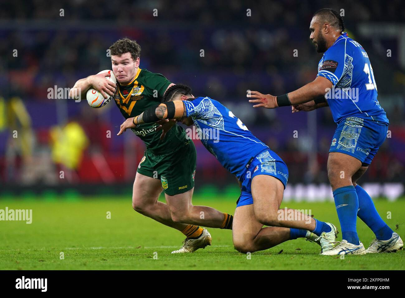Australia's Liam Martin (left) is tackled by Samoa's Tim Lafai during ...