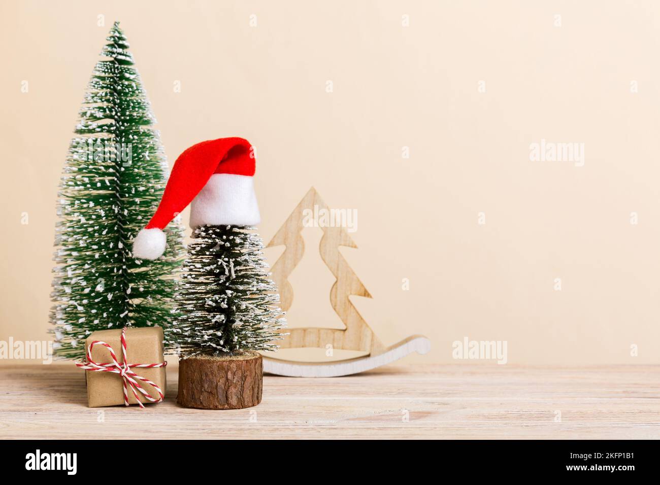 Christmas composition. Gifts, small tree, branches and craft DIY ...