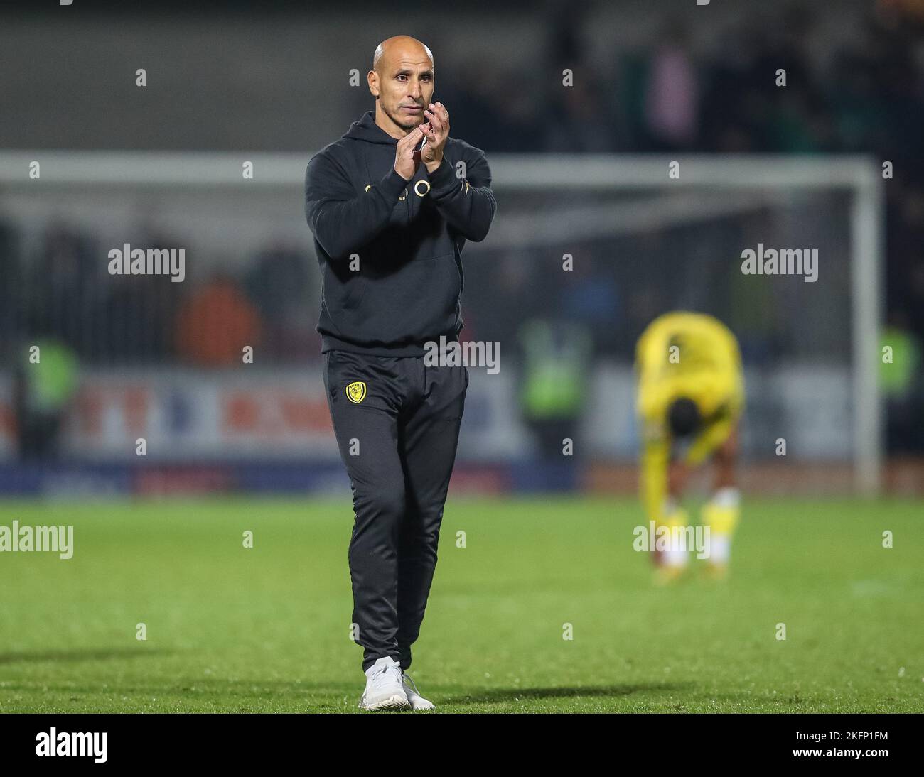Dino Maamria Manager of Burton Albion applauds the home fans after the ...
