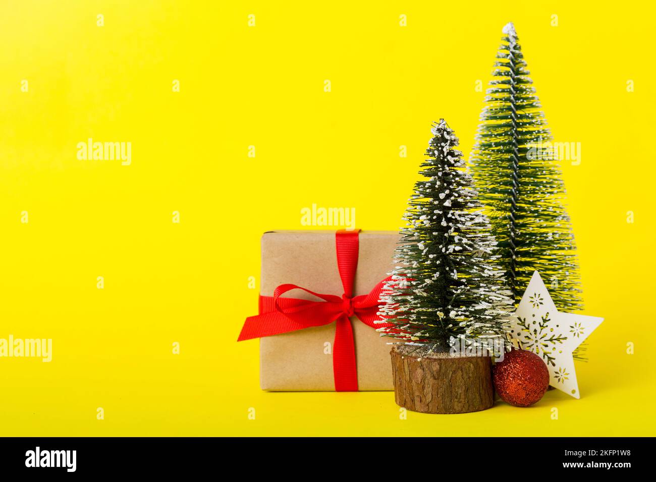 Christmas composition. Gifts, small tree, branches and craft DIY ...