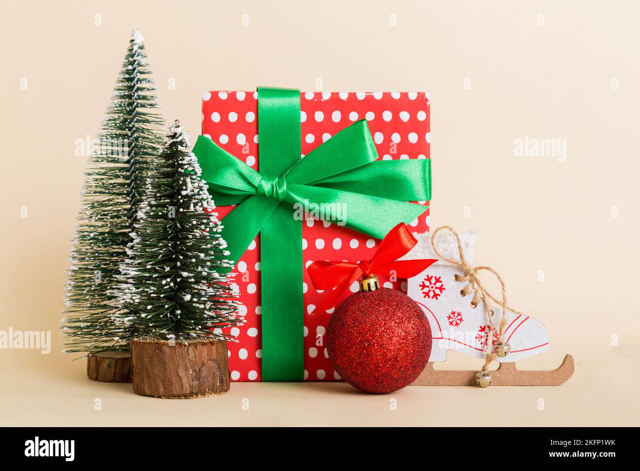 Christmas composition. craft Gift box, small tree, branches and craft ...