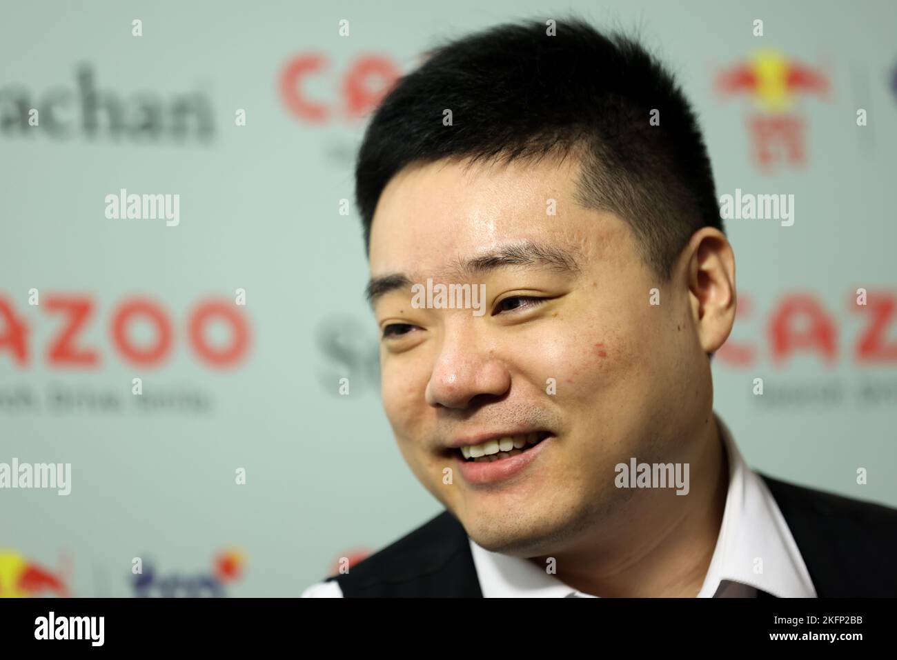 China’s Ding Junhui is interviewed following victory on day eight of ...