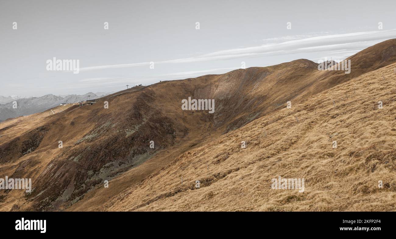 a mountain pasture among the Alps at fall Stock Photo - Alamy