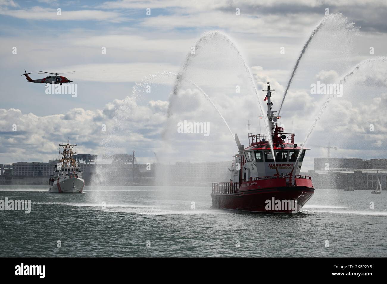 The Boston Fire Department provides a water salute for the Coast Guard ...