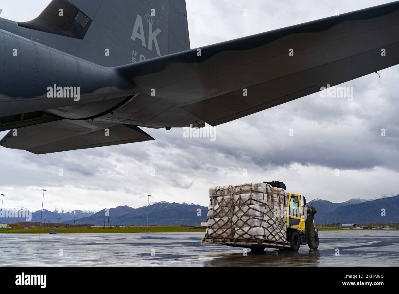 Alaska Air National Guard Master Sgt. Derick Hansen, a loadmaster ...