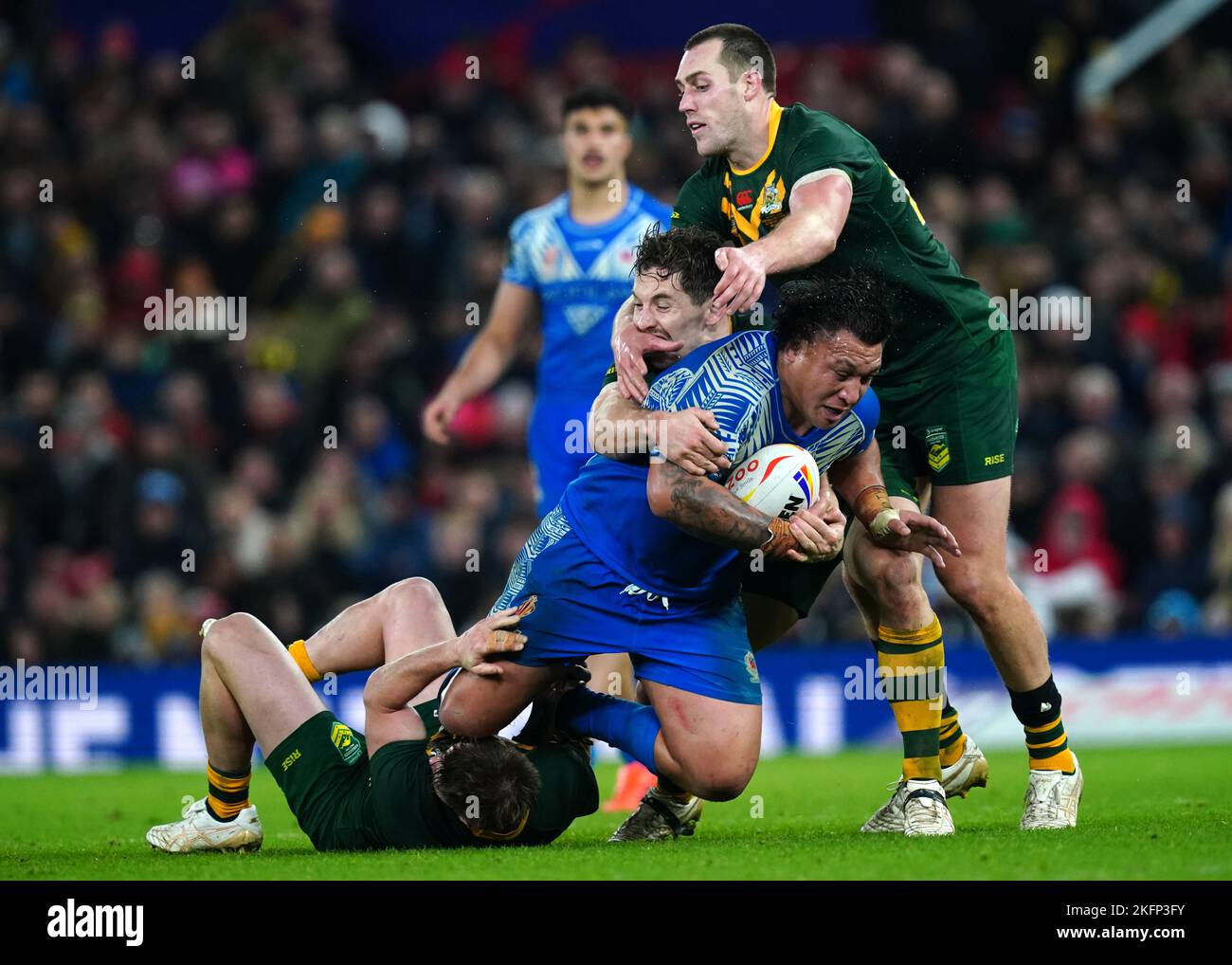 Samoa's Josh Papali'i (centre) tackled by Australia's Cameron Murray ...