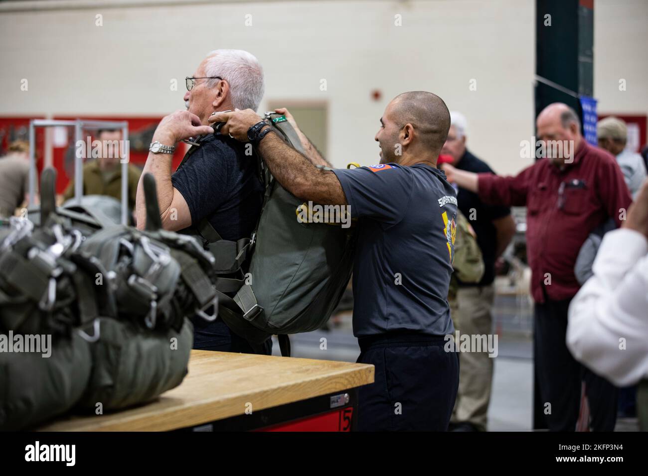 Retired U.S. Army Spc. 5 Lynn Naasz, Company O Arctic Ranger, tries on ...