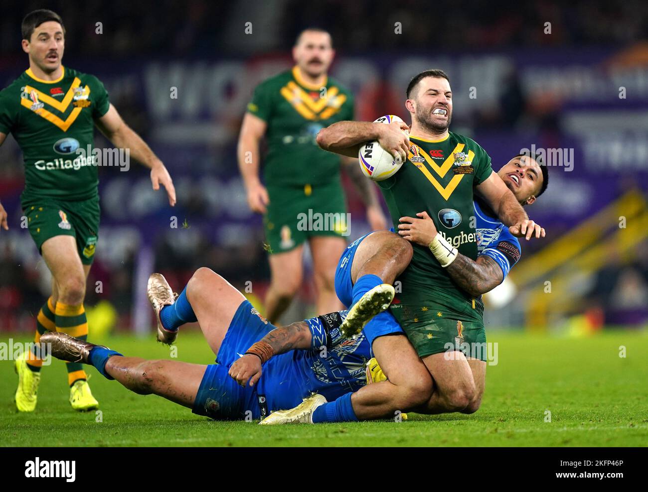 Australia's James Tedesco is tackled during the Rugby League World Cup ...