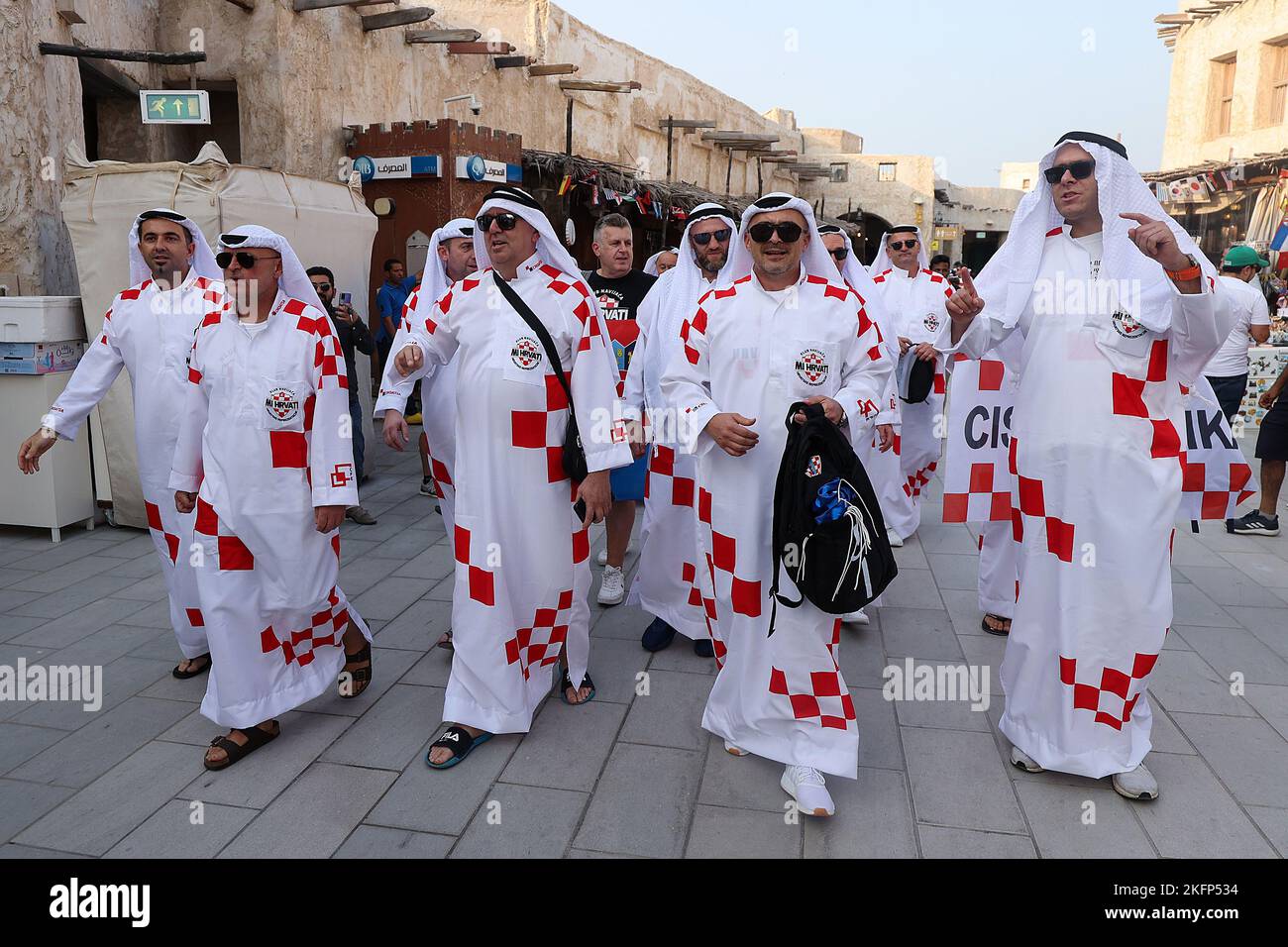 Doha, Qatar on November 19, 2022. Croatian fans in traditional Qatari ...