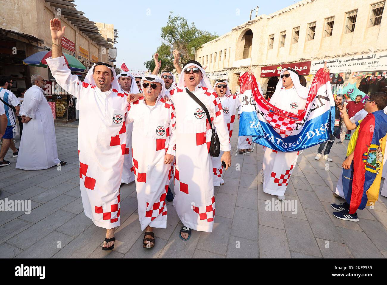 Doha, Qatar on November 19, 2022. Croatian fans in traditional Qatari ...